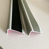 China Anti-Slip PVC Rubber Stair Nosing Edge Trim with Cutting Service and Protective Strip for sale