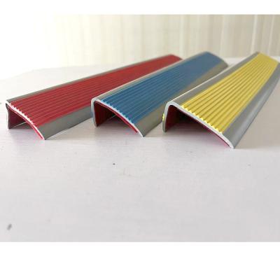 China Fireproof Anti Slip Vinyl Adhesive Stair Nosing Tread with Waterproof Rubber Trim for sale