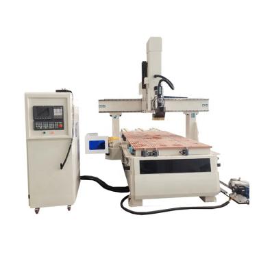 China 3D Desktop Door ATC Wood Woodworking Machine 4 Axis CNC Router for sale