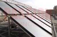 China 8000L Resort Solar Water Heating Solution Blue Titanium Flat Plate Solar Collector for sale