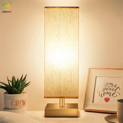 China Nordic Eye Protection Solid Wood LED Bedside Table Lamp With Square Linen for sale