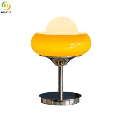 China LED Yellow Metal Glass Bedside Table Lamp Bauhaus Egg Tart Shape 40W for sale