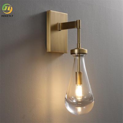 China Drops Blown Glass Gold Modern Wall Light For Bedroom Living Room for sale