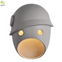 China Nordic creative mask wall lamp for homestay living room bedroom aisle for sale