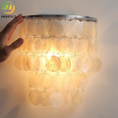 China Nordic Simple Shell Wall Lamp Living Room Bedroom Bedside Aisle Lamp for sale