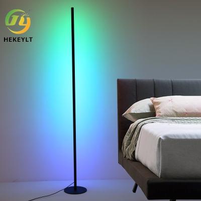China Round Bottom Simple Line Floor Lamp Living Room Sofa Children'S Room Vertical Creative Atmosphere LED Floor Lamp for sale