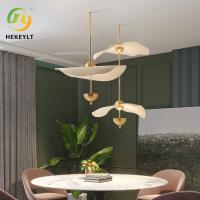 China Modern Simple Nordic Creative Gold Pendant Light Living Room Stair Bar Lotus Lamp for sale