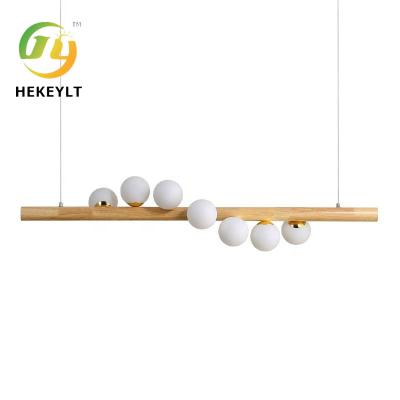China Nordic Solid Wood Style Restaurant Lamp Simple Modern LED Creative Bar Chandelier for sale