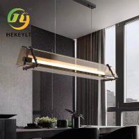 China Modern Simple Light Luxury Art LED Strip Chandelier Bar Restaurant Office Industrial Glass Pendant Light for sale