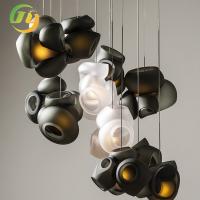 China Customized Modern Suspended Sphere Pendant Lights with Yellow Glow-Perfect for Future Villa Hotel Hall Staircase for sale