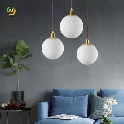 China JYLIGHTING Nordic Simple Postmodern Personality Creative Bedside Lamp Single Head Milky White Glass Ball Modern Pendant Light for sale