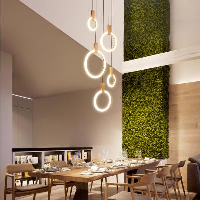 China JYLIGHTING Acrylic Rings Pendant Light Stair Wood Hanging Modern LED Chandelier Ceiling Nordic Living Room Hotel Pendant for sale