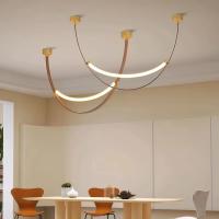 China JYLIGHTING Artistic Arch LED Chandelier with Leather & Silicone Light Strip, Height Adjustable Linear Pendant Lamp for Home & Commercial Space Lighting for sale