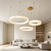 China JYLIGHTING Modern Hollow Ring Alabaster Pendant Light, Brass Framed Spanish Alabaster Chandelier, Decorative Circular Ceiling Light for High-End Interior Projects for sale