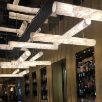 China JYLIGHTING Natural Spanish Alabaster Tube Chandelier with Copper Bracket, Custom Linear Hanging Light, Soft Glow Decorative Lamp for Hotel Lobby & Sales Office Projects for sale
