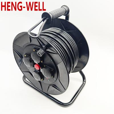 China Black retractable cable reel outdoor designed for easy cable deployment and retraction in challenging outdoor work sites for sale