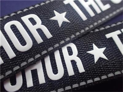 China Symphony Printing Eco - Friendly Silicone Logo Patch Fade Resistance Strong Stretch for sale