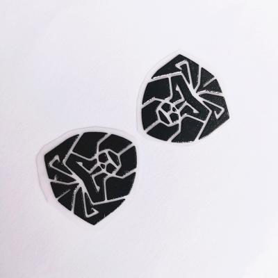 China 100 Material Shinny Silicone 3D Rubber Patches Heat Seal Labels For Clothing for sale