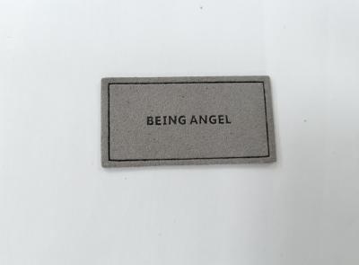 China Microfiber Embossed Logo PU Leather Label Sew On Clothing Customize Design for sale