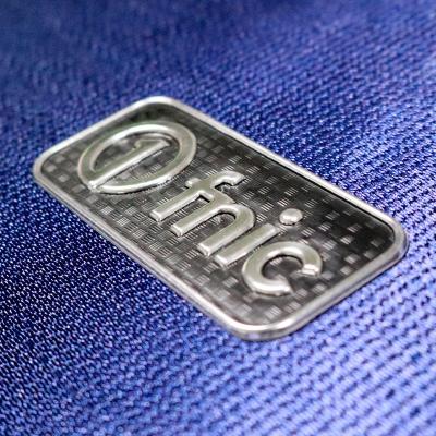 China Customized Clothing 3D Silver Black Tpu Heat Metal Transfer Logo for Garment for sale