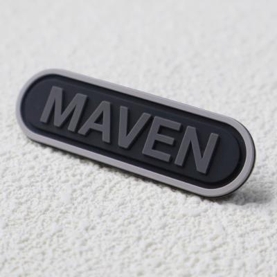 China Bulk Custom 3D Raised PVC Brand Badge - Durable Two-Tone Logo Emblem for Fashion Apparel & Luggage Accessories for sale