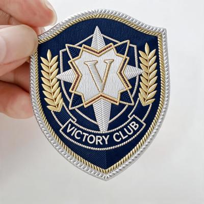 China Custom Embroidered Patches Heat Transfer with Multiple Color Options and Tested Wash Resistance Ideal for Ski Wear and Jackets for sale