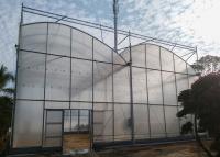 China Single Layer Greenhouse Hydroponics System Wrought Iron Greenhouse With Film Surface for sale