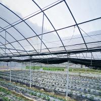 China Film Cover Fiber Glass Greenhouse 8m Tunnel Width With Cooling Pad for sale