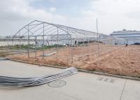 China 19.68' Climate Control Greenhouse PE Roof Height 6m With Ceiling Fan for sale