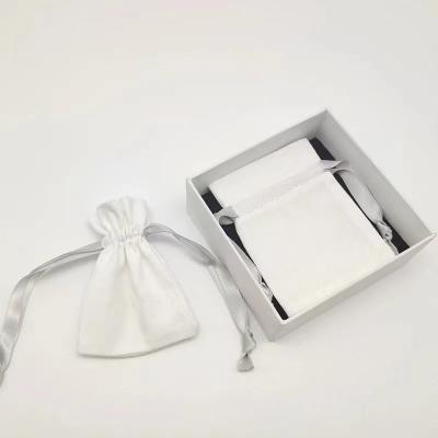 China Gold Foil Drawstring Gift Pouches Shipping Jewelry Packaging Bag With Logo for sale
