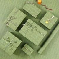 China Green Embossing Cardboard Cosmetic Packaging Box With Ribbon for sale