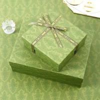 China Green Embossing Cardboard Cosmetic Packaging Box With Ribbon for sale