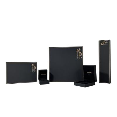 China Soft Leatherette Paper Luxury Jewelry Packaging Boxes Chinese Font Logo Jewelry Box for sale