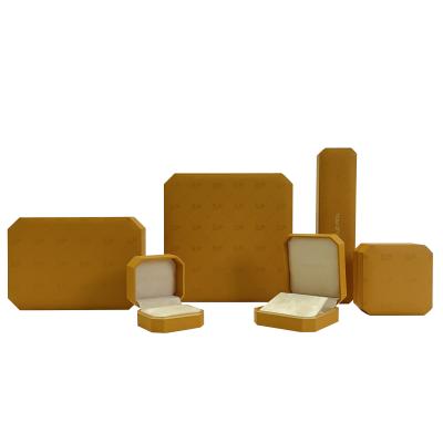 China Octagon Shape Customized Jewelry Packaging Box With Gold Line for sale