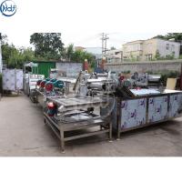 China Large potato chip frying line leisure food factory equipment KFC potato chip chicken leg frying line for sale