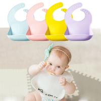 China 2022 Amazon Hot Sale Food Grade Waterproof Silicone Baby Bibs Wholesale With Catcher Pocket for sale