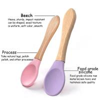 China Wooden Handle Infant Feeding Spoon BPA Free Food Grade Soft Silicone Baby Spoon for sale