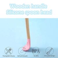 China Wooden Handle Infant Feeding Spoon BPA Free Food Grade Soft Silicone Baby Spoon for sale