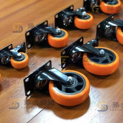 China 5 Inch Orange PVC Caster Wheel Double Brake Double Ball Bearing 125kg Capacity Swivel Equipment for sale