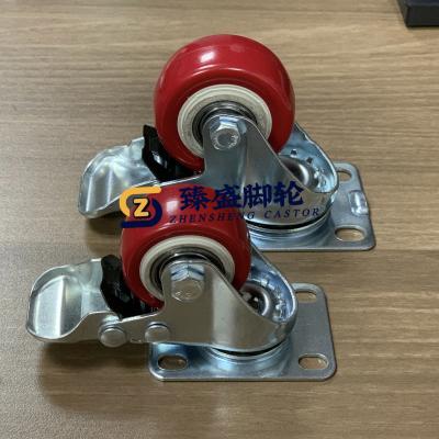 China Red 1.5 Inch PP Caster Wheel 38mm Diameter Double Ball Bearings 100 lbs Load Capacity for sale
