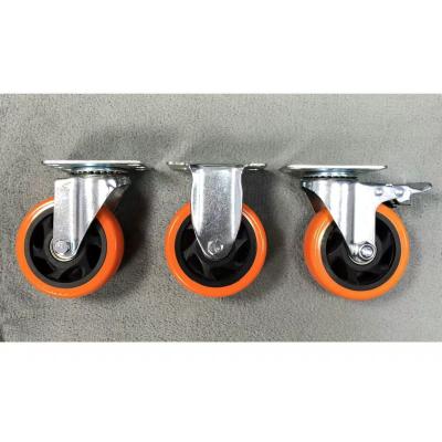 China Orange PP Caster Wheels Double Brake 100mm 4 Inch Swivel Casters for Industrial Machine for sale