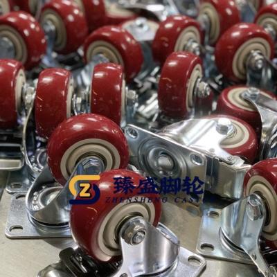 China 3 Inch Red PP Caster Wheels with Double Ball Bearings and Brake System 75mm for sale