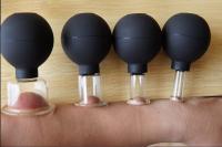 China 4 Pieces Black Glass Face Cupping Therapy Set Silicone Vacuum Facial Massage Cups Anti Cellulite Lymphatic Sets for sale