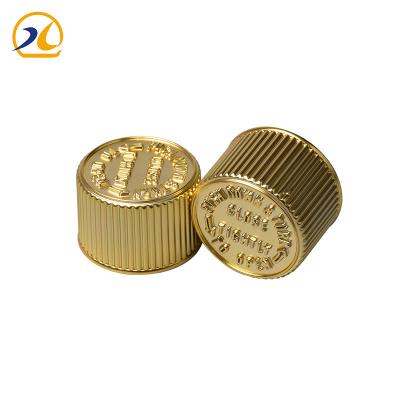 China Electroplating Gold Child Proof Lid , 20mm Pharmaceutical Bottle Cap for sale