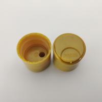 China Polypropylene 24mm Yellow Disc Top Cap For Shampoo Bottle for sale