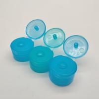 China Round Top 28/410 blue Plastic Flip Top Cap For Lotion Bottle for sale