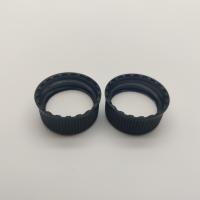 China Ribbed Wall 20/400 Black Plastic Screw Caps For Lotion Bottle for sale