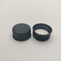 China Ribbed Wall 20/400 Black Plastic Screw Caps For Lotion Bottle for sale