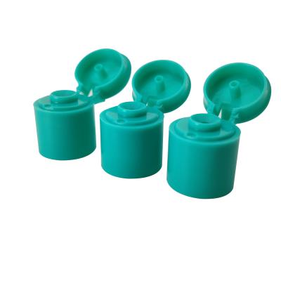 China Green PP 15/415 Plastic Bottle Flip Top Cap For Makeup Remover for sale