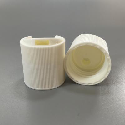 China Non Dripping 24mm Flip Top Plastic Bottle Caps For Skin Care Bottle for sale